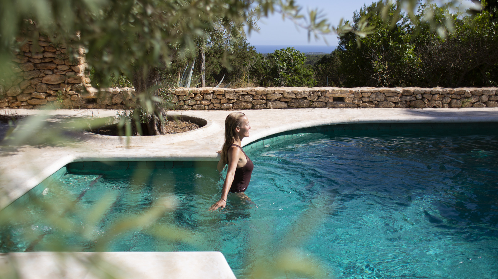 Budget-Friendly Tricks To Keep Your Outdoor Pool Warm