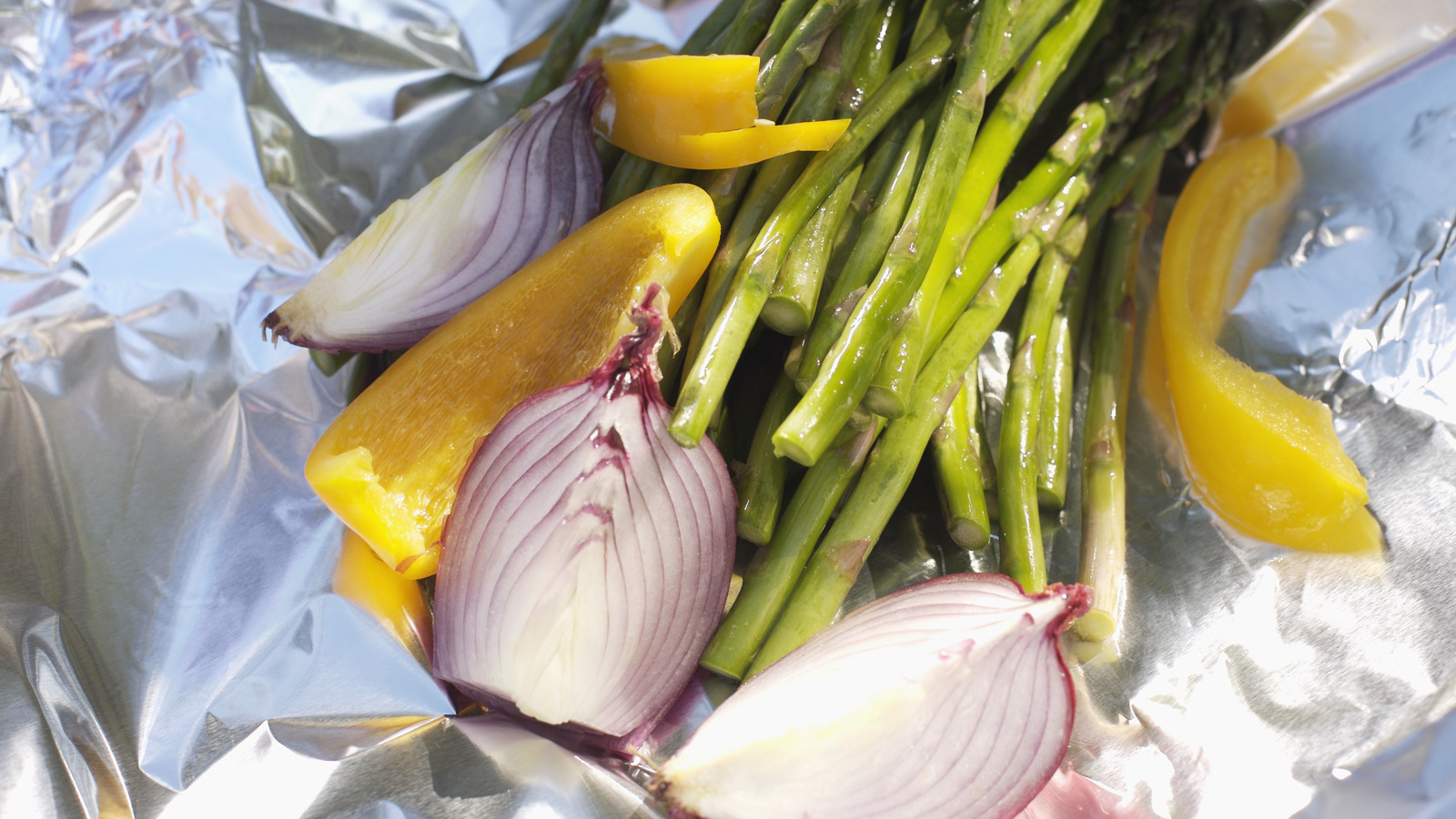 Hack A Campfire Cooking Pot With Only Aluminum Foil & A Branch