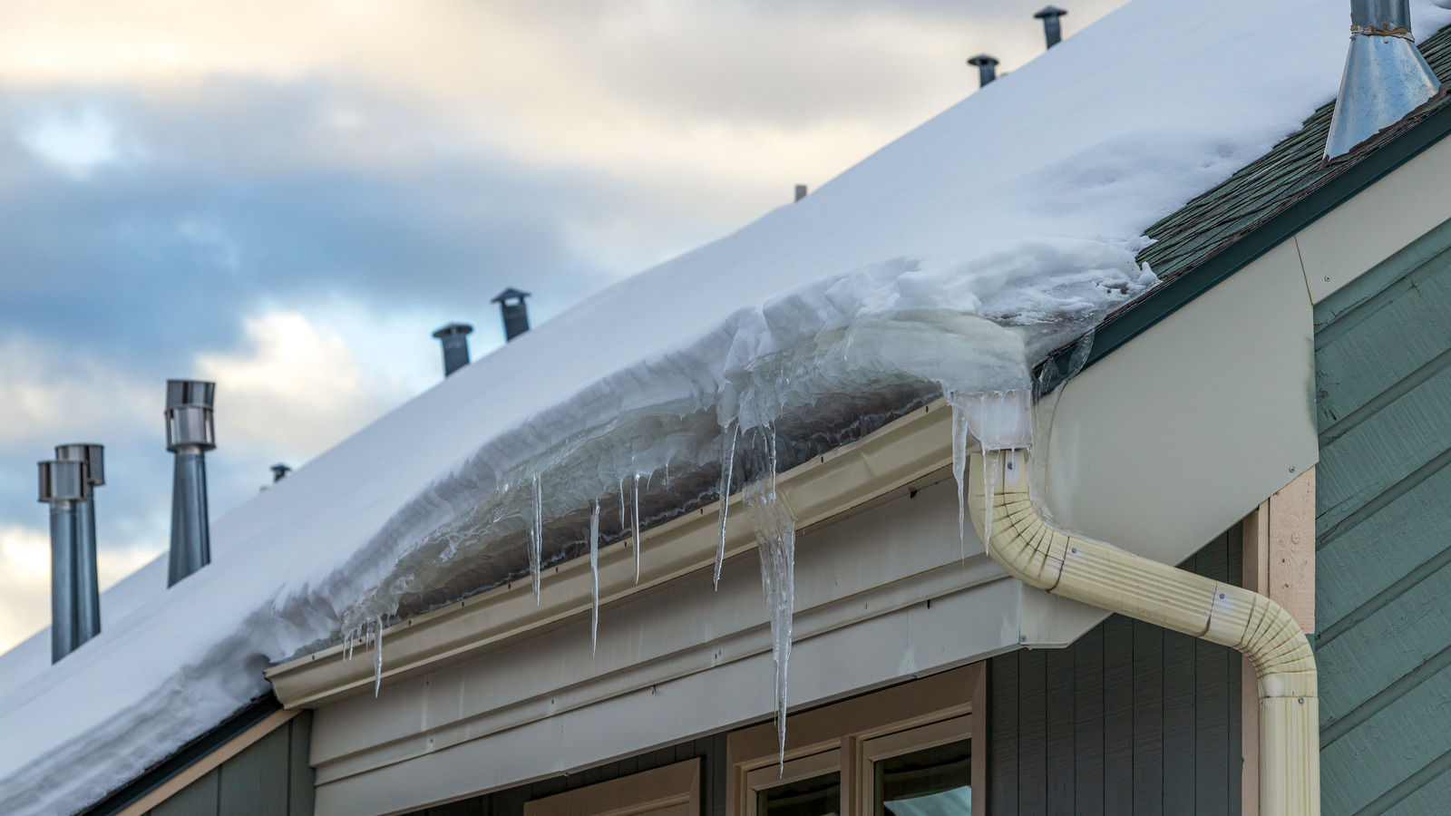Safely Remove Ice Dams From Your Roof With This Easy Solution