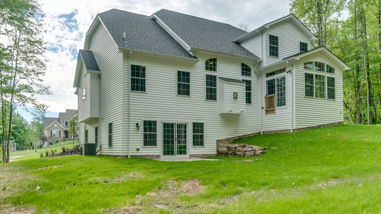 The Stylish Fencing Solution That'll Add Privacy To Your Sloped Yard