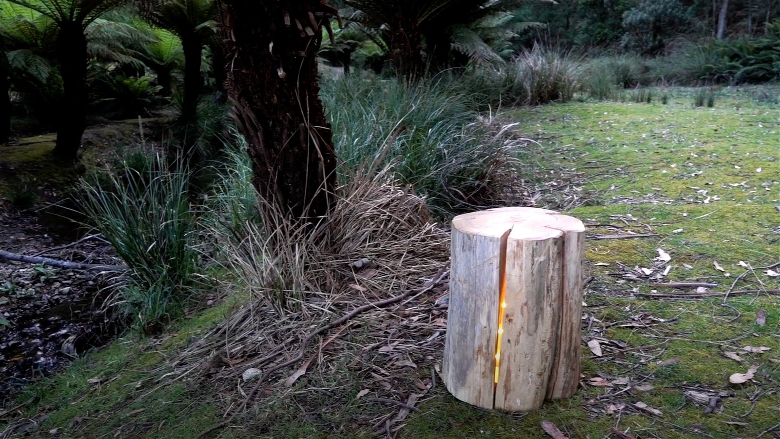 These DIY Light-Up Logs Will Add Some Rustic Whimsy To Your Outdoor Space